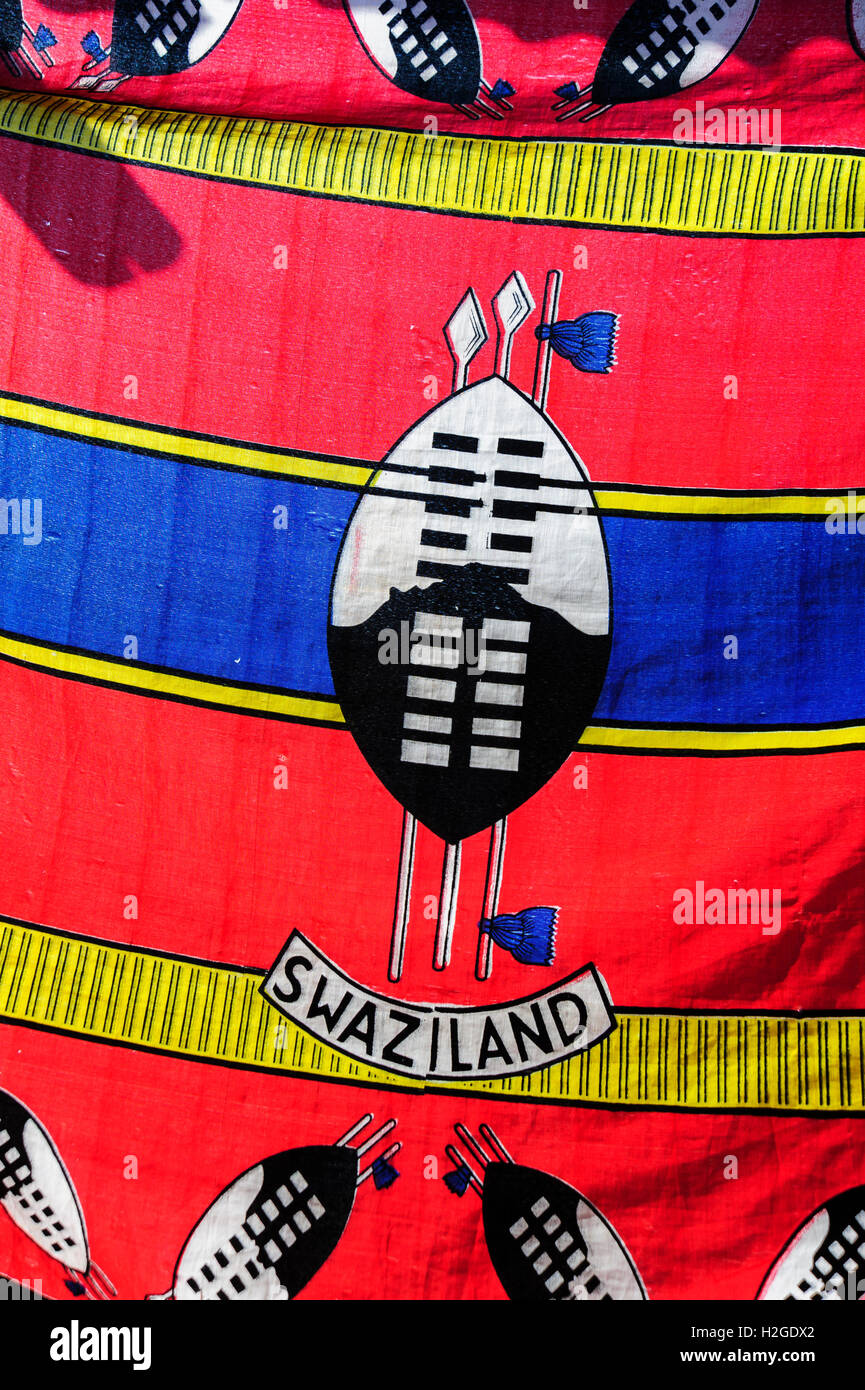 Colorful Swaziland flag designs on fabrics at a Swazi craft market ...
