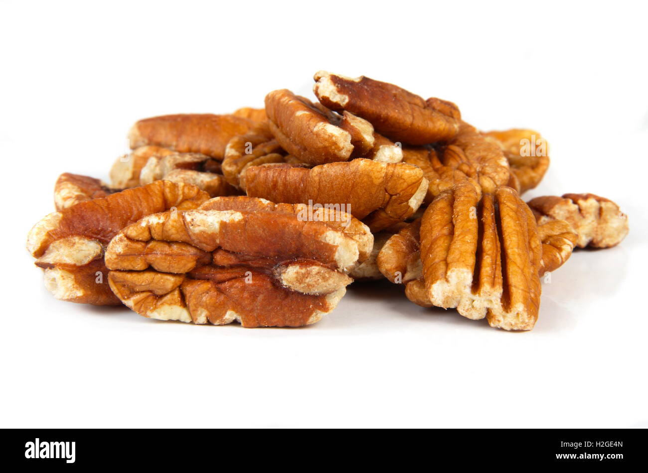 healthy nuts closeup over white Stock Photo - Alamy