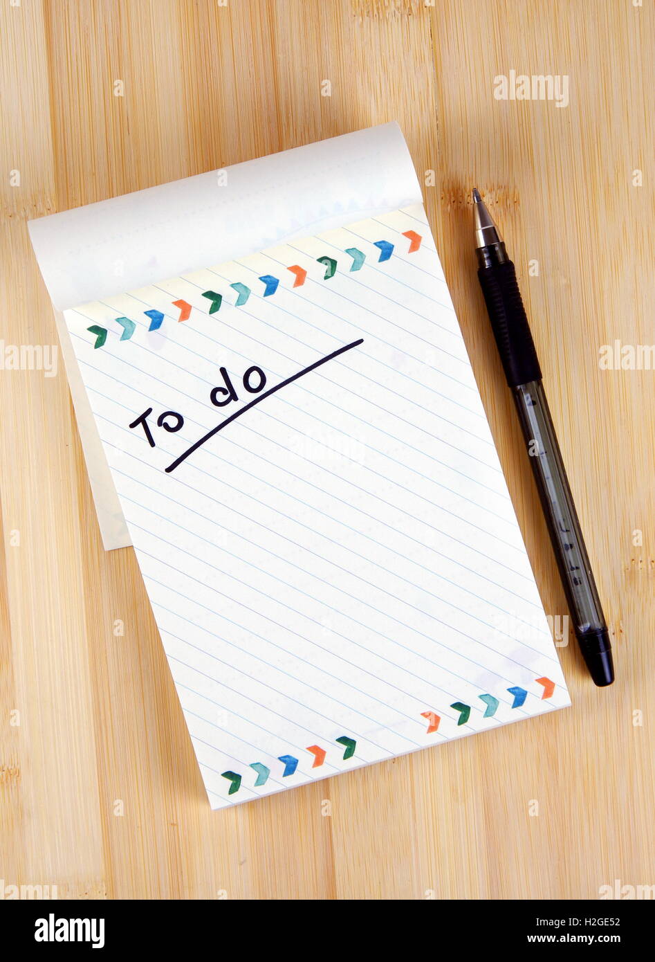 to do list notepad over table Stock Photo - Alamy