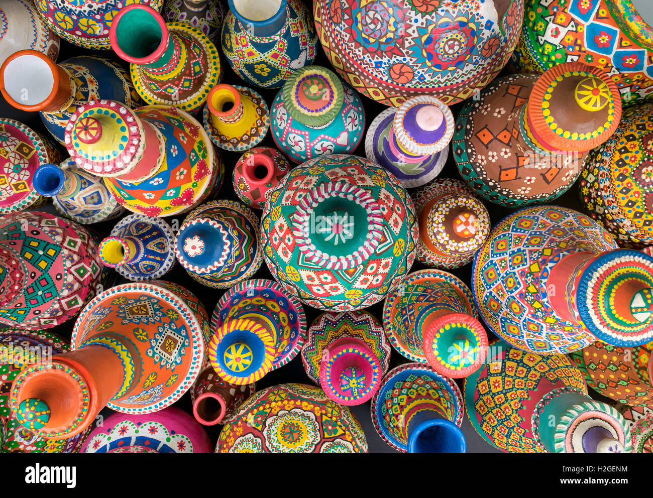 Top view showing a composition of artistic painted handcrafted pottery ...