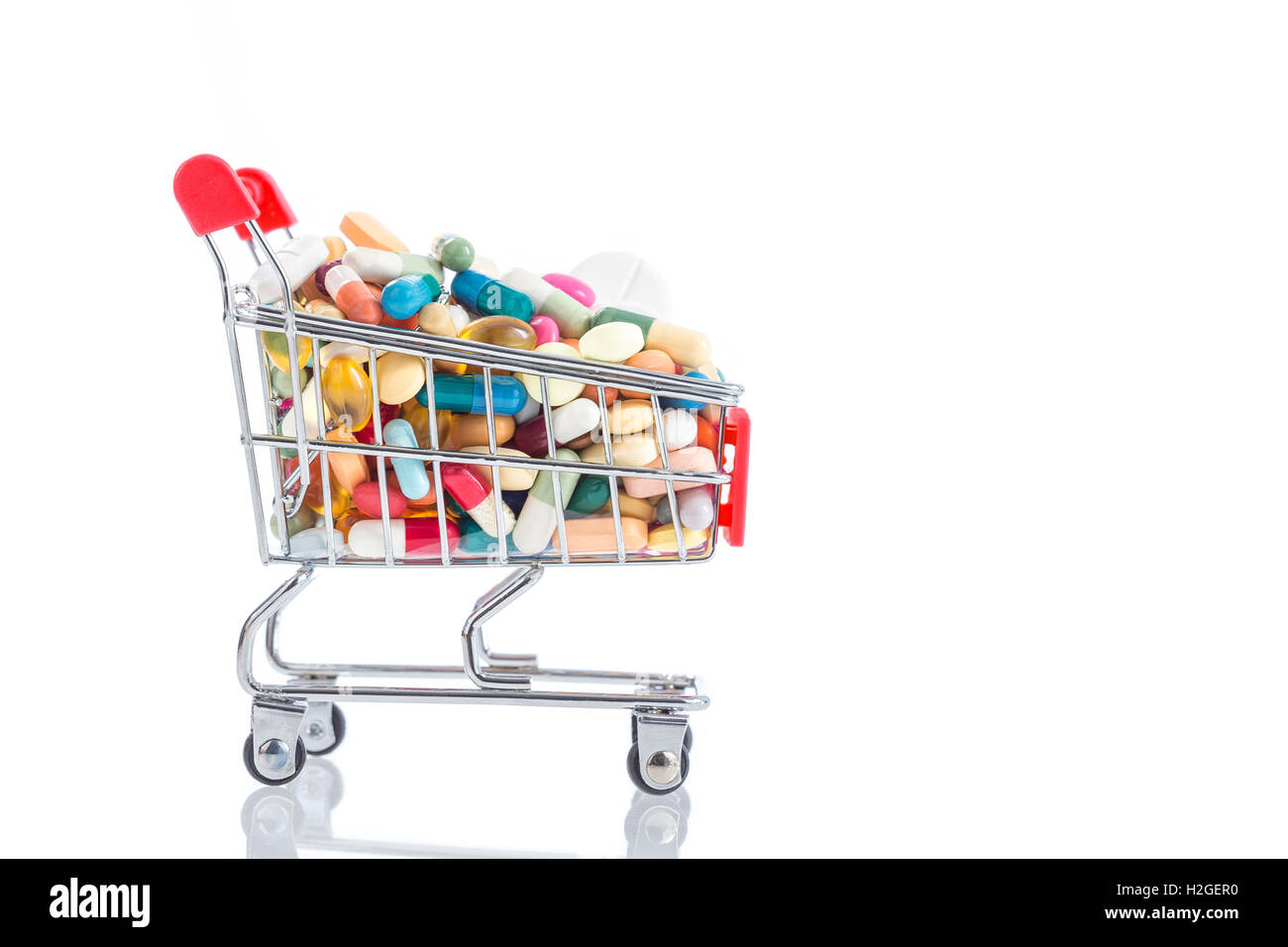 Isolated shopping cart full of medicine with pills and capsules Stock ...