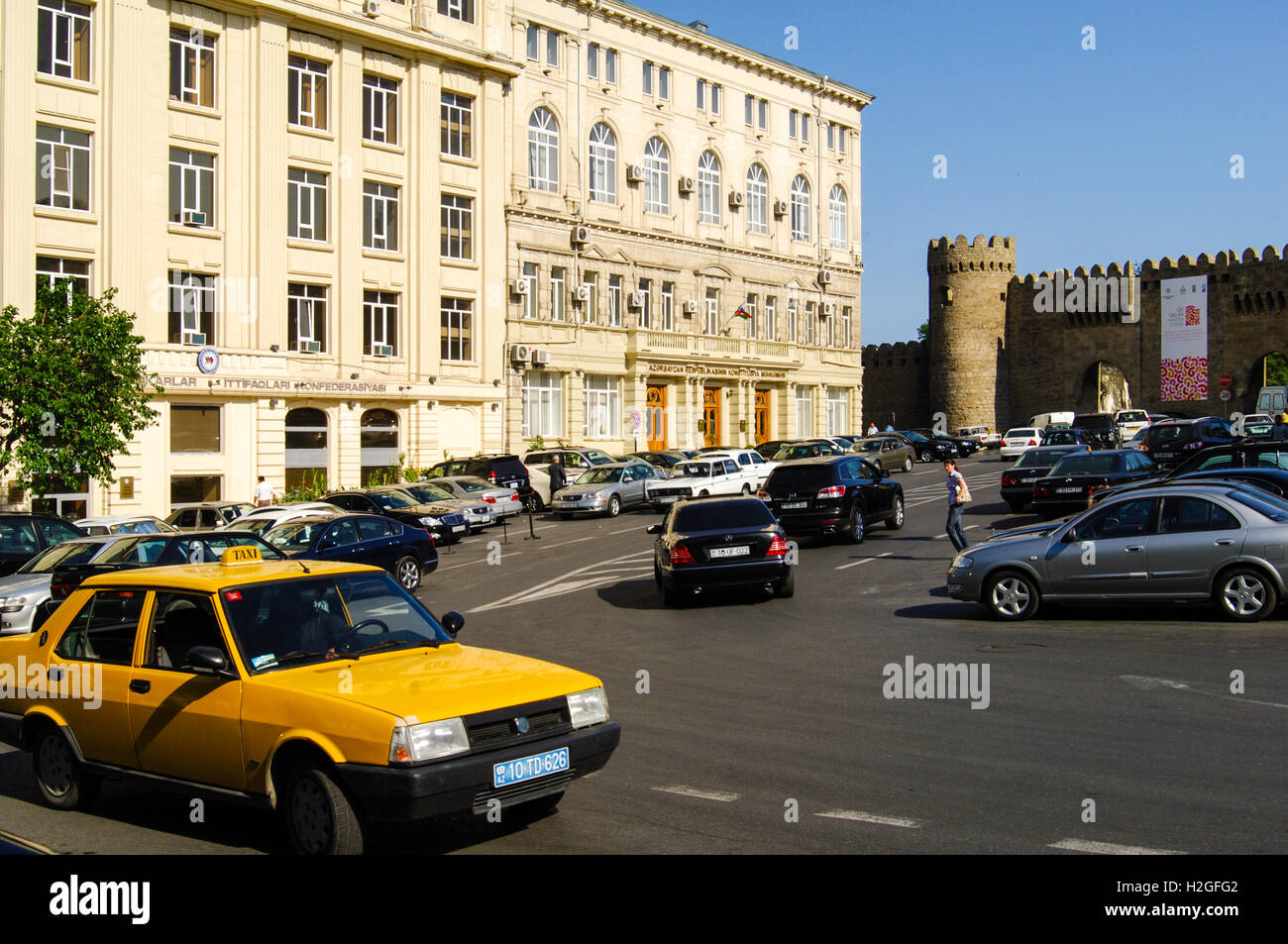 Azerbaijan, Baku. Traffic in Baku. Walls are surrounding the Old City ...