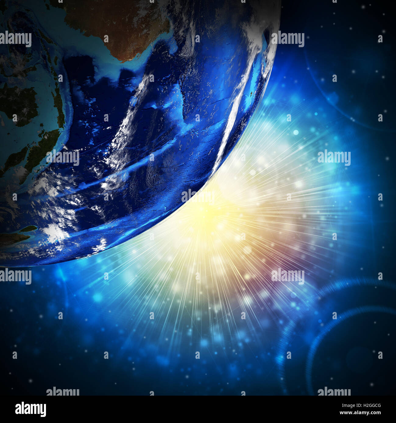 Earth planet in sun rays Stock Photo - Alamy