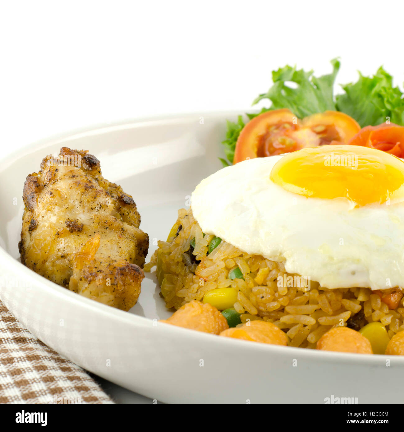 American fried rice isolated on white Stock Photo - Alamy