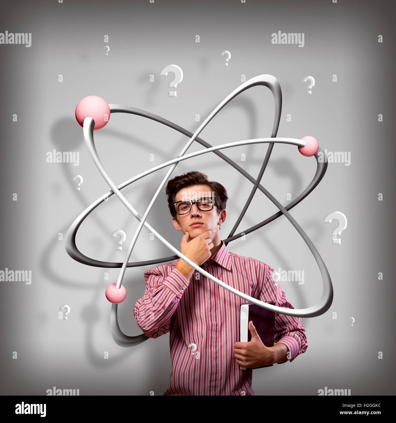 young man scientist with glasses thinking Stock Photo - Alamy