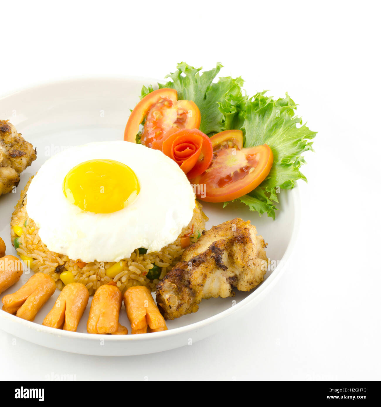 American fried rice isolated on white Stock Photo - Alamy