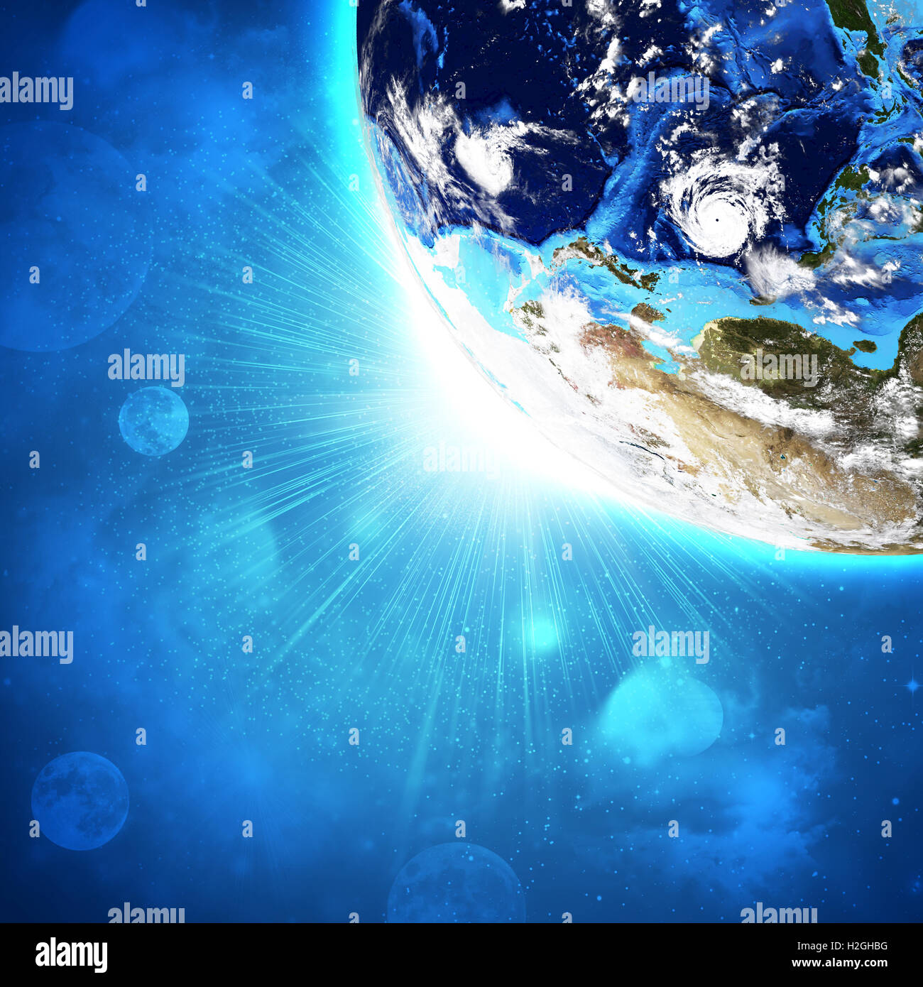 Earth planet in sun rays Stock Photo - Alamy
