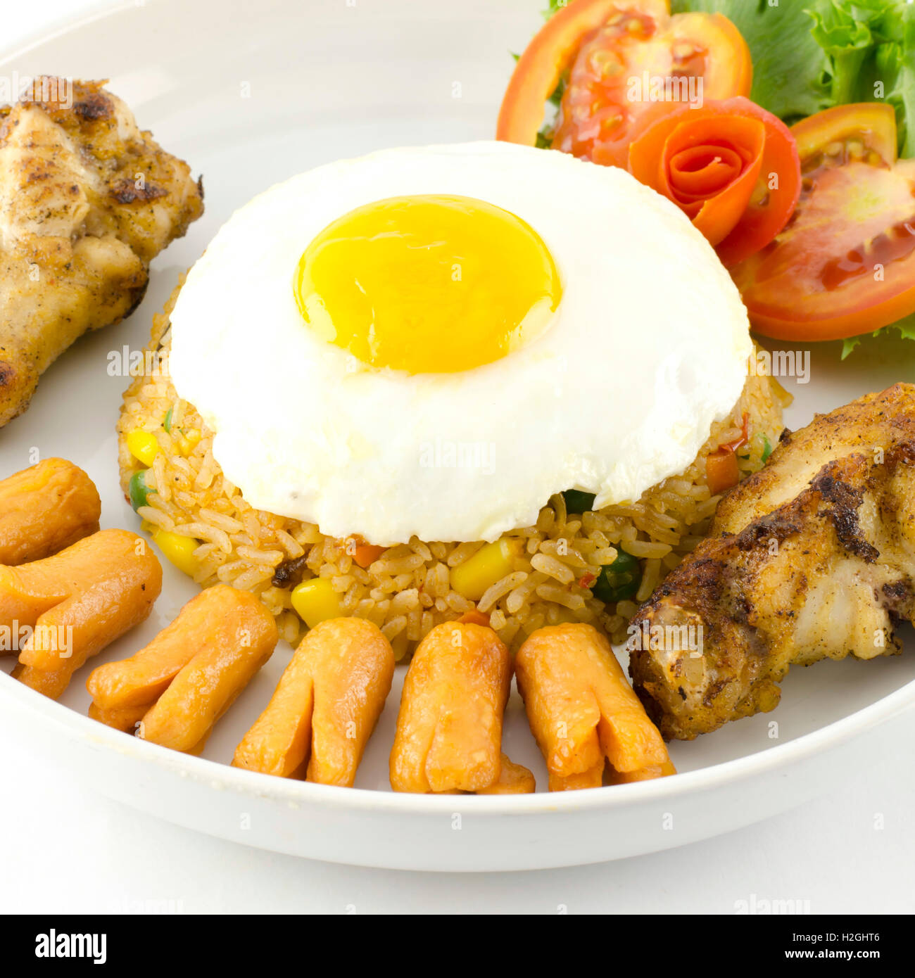 American fried rice isolated on white Stock Photo - Alamy