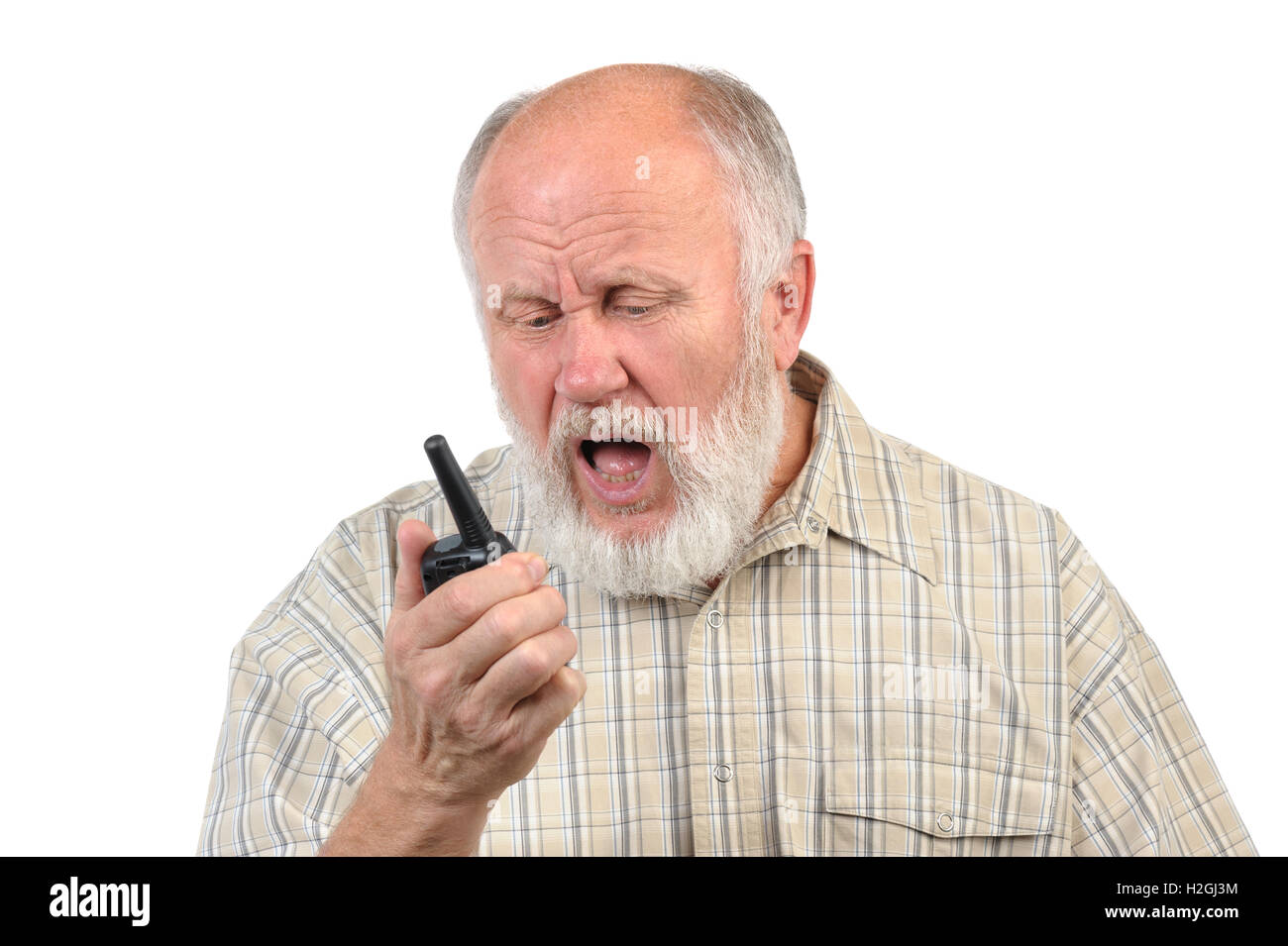 senior bald man talking using walkie-talkie Stock Photo - Alamy