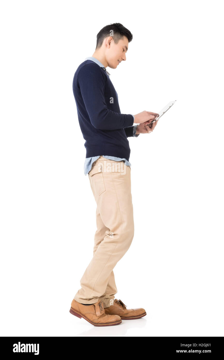 Asian man using pad Stock Photo - Alamy
