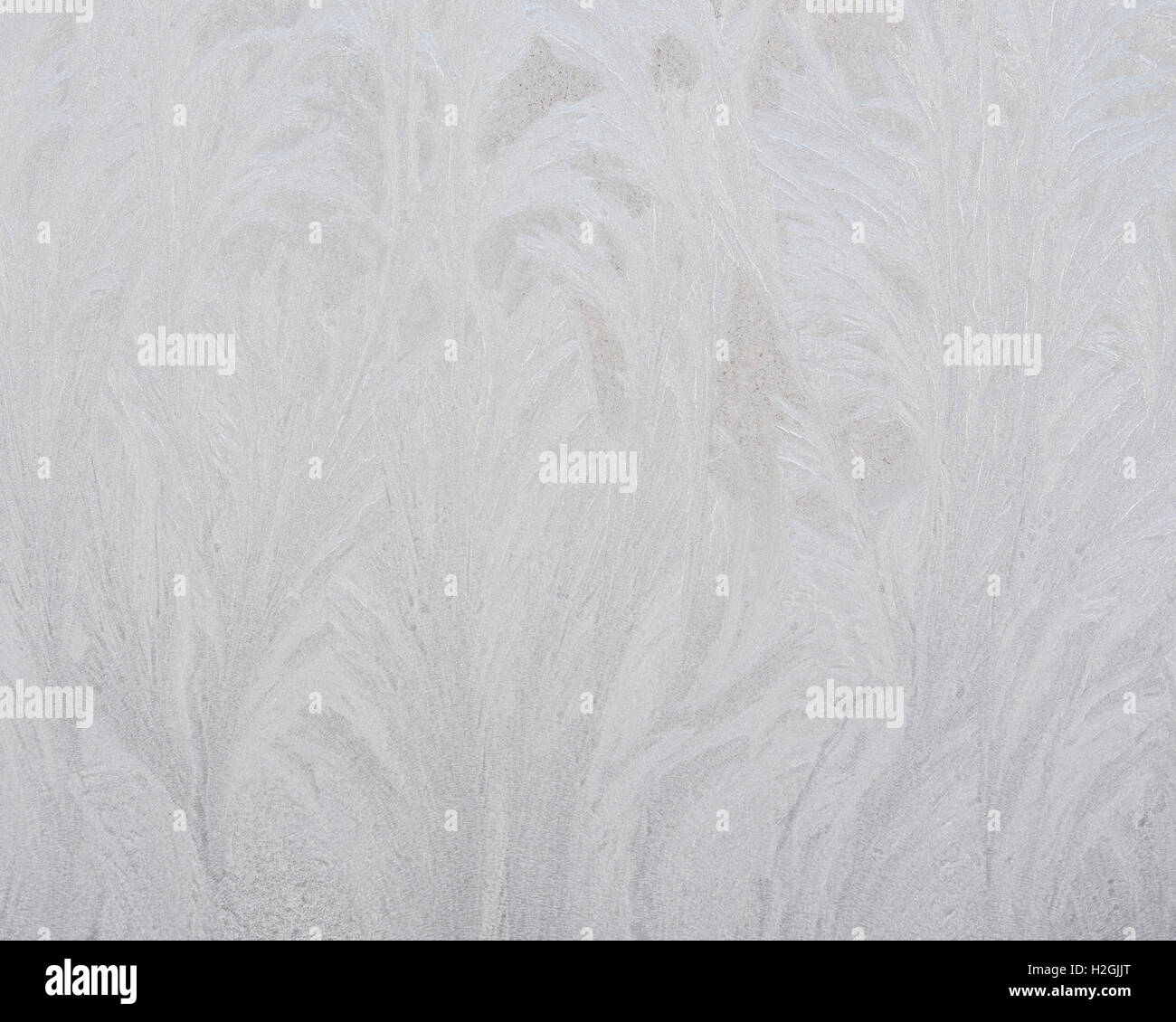 Frosty pattern on glass winter window Stock Photo - Alamy