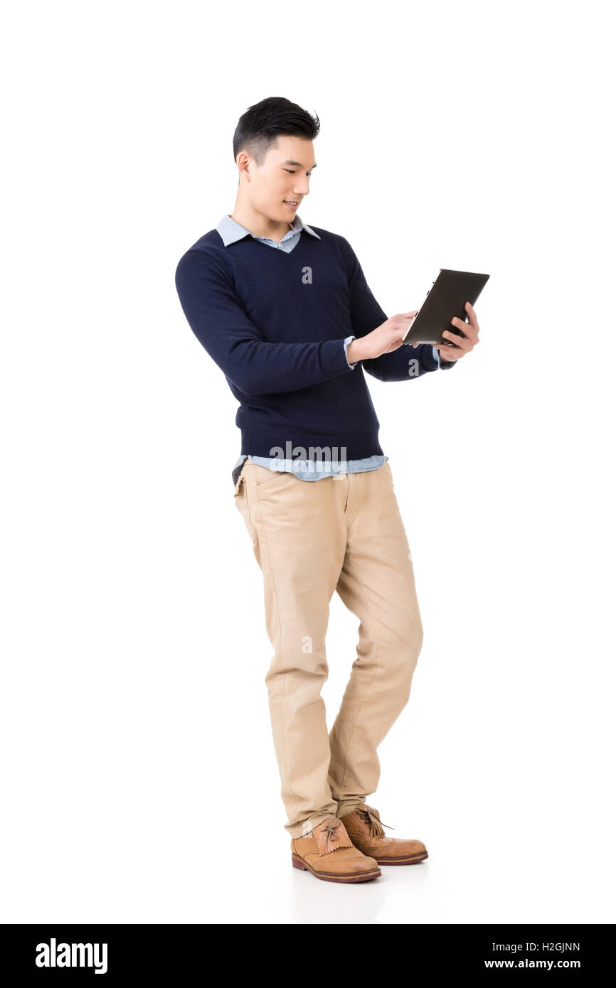 Asian man using pad Stock Photo - Alamy