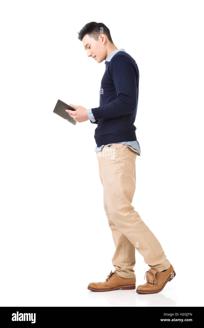 Asian man using pad Stock Photo - Alamy