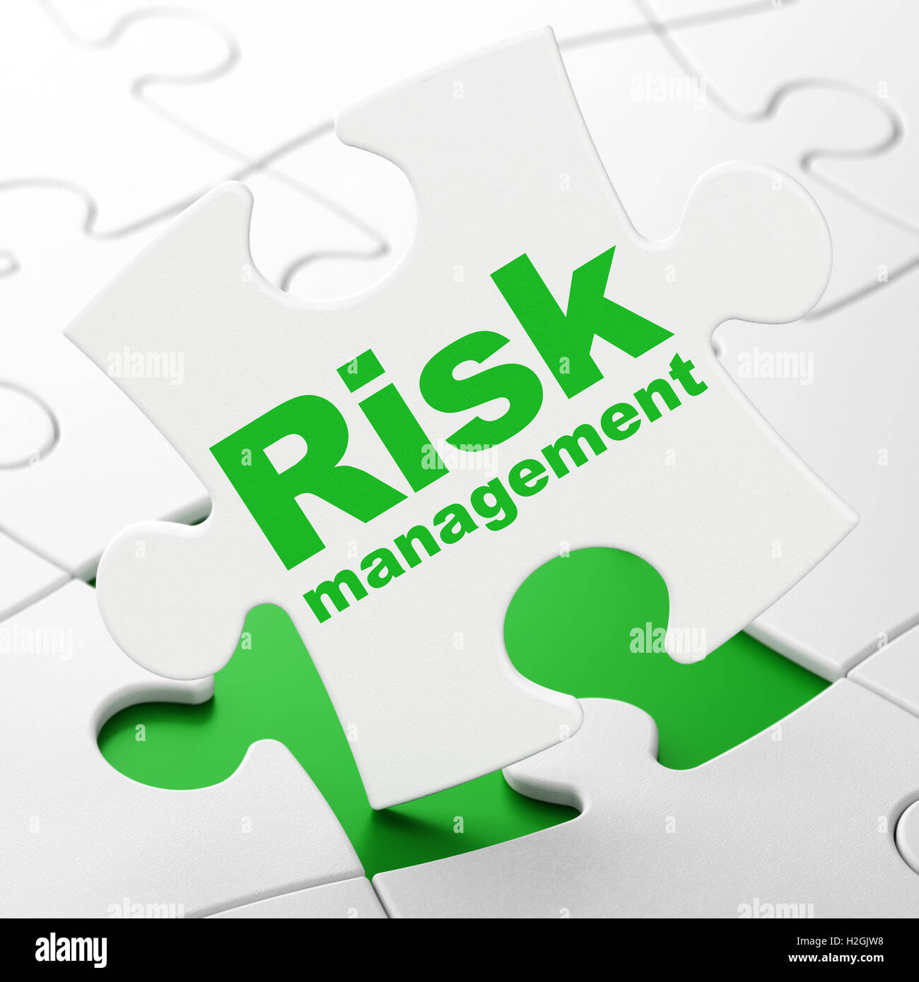 Finance concept: Risk Management on puzzle background Stock Photo - Alamy