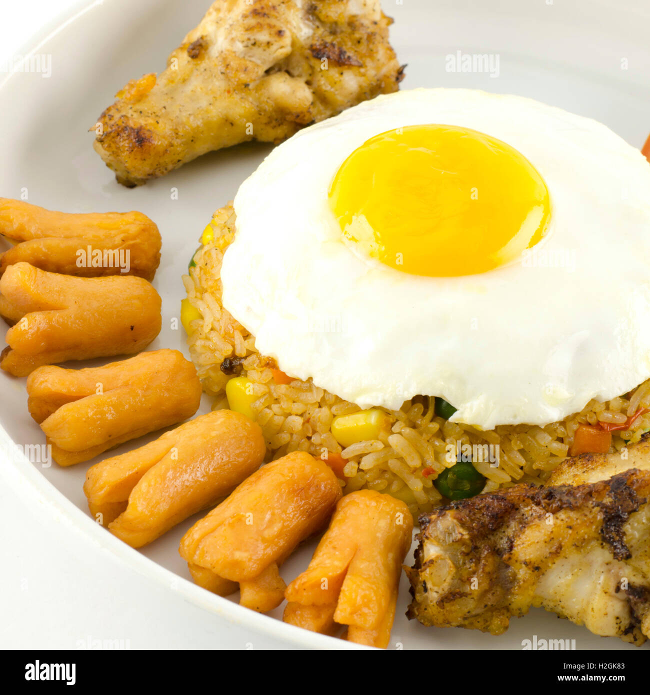 American fried rice isolated on white Stock Photo - Alamy