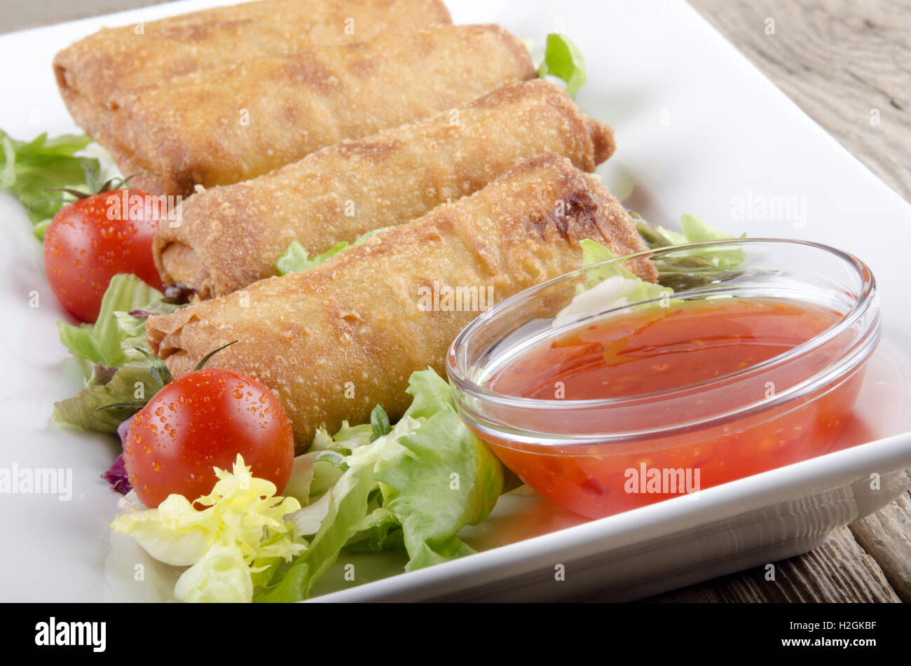 chinese spring rolls on a plate Stock Photo - Alamy