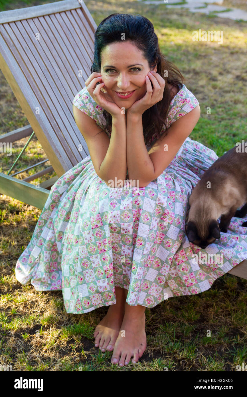 Woman gardening. Mature girl gardening in her backyard. spring s Stock ...