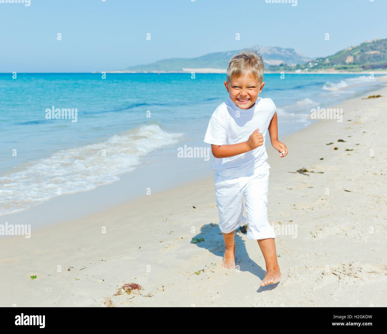 Boy on the beach Stock Photo - Alamy