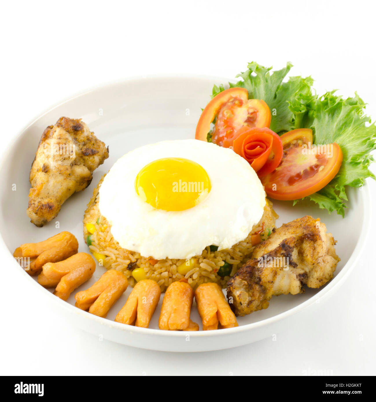 American fried rice isolated on white Stock Photo - Alamy