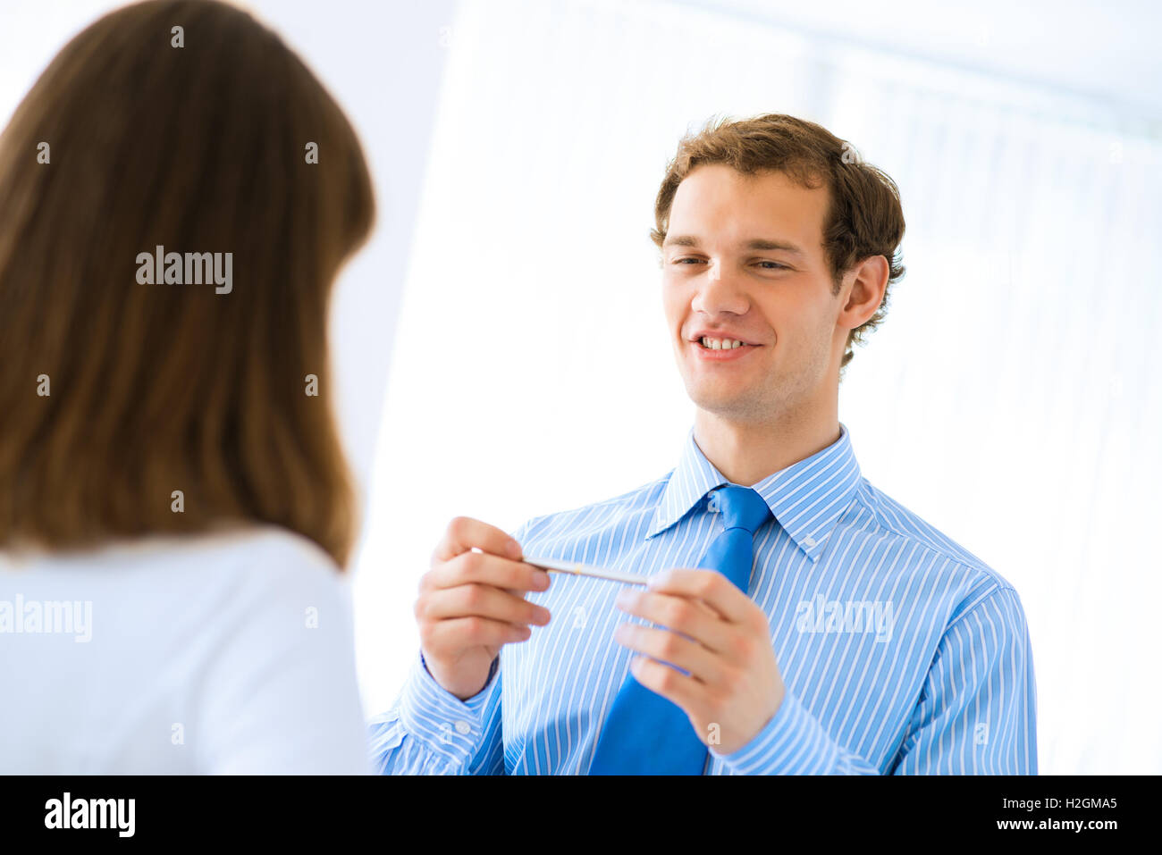 Young businessman doing interviews Stock Photo - Alamy