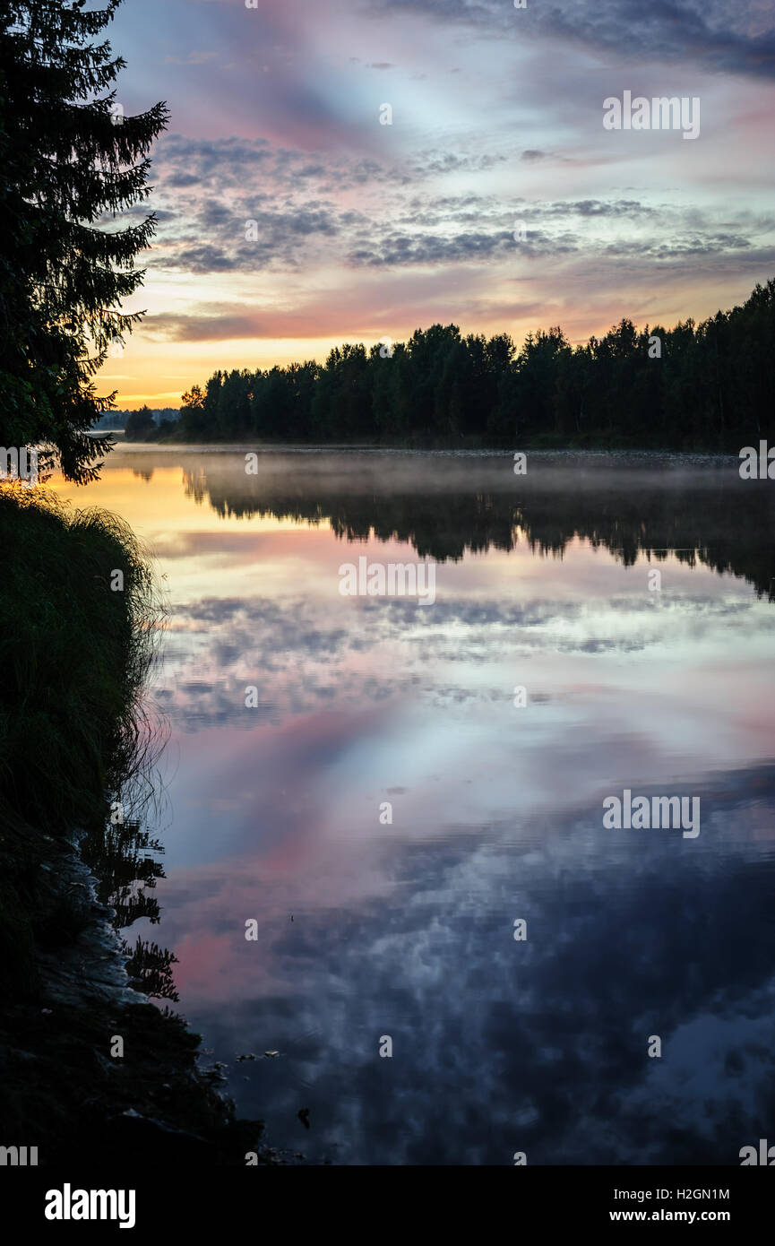 Sunset over the northern river Stock Photo - Alamy