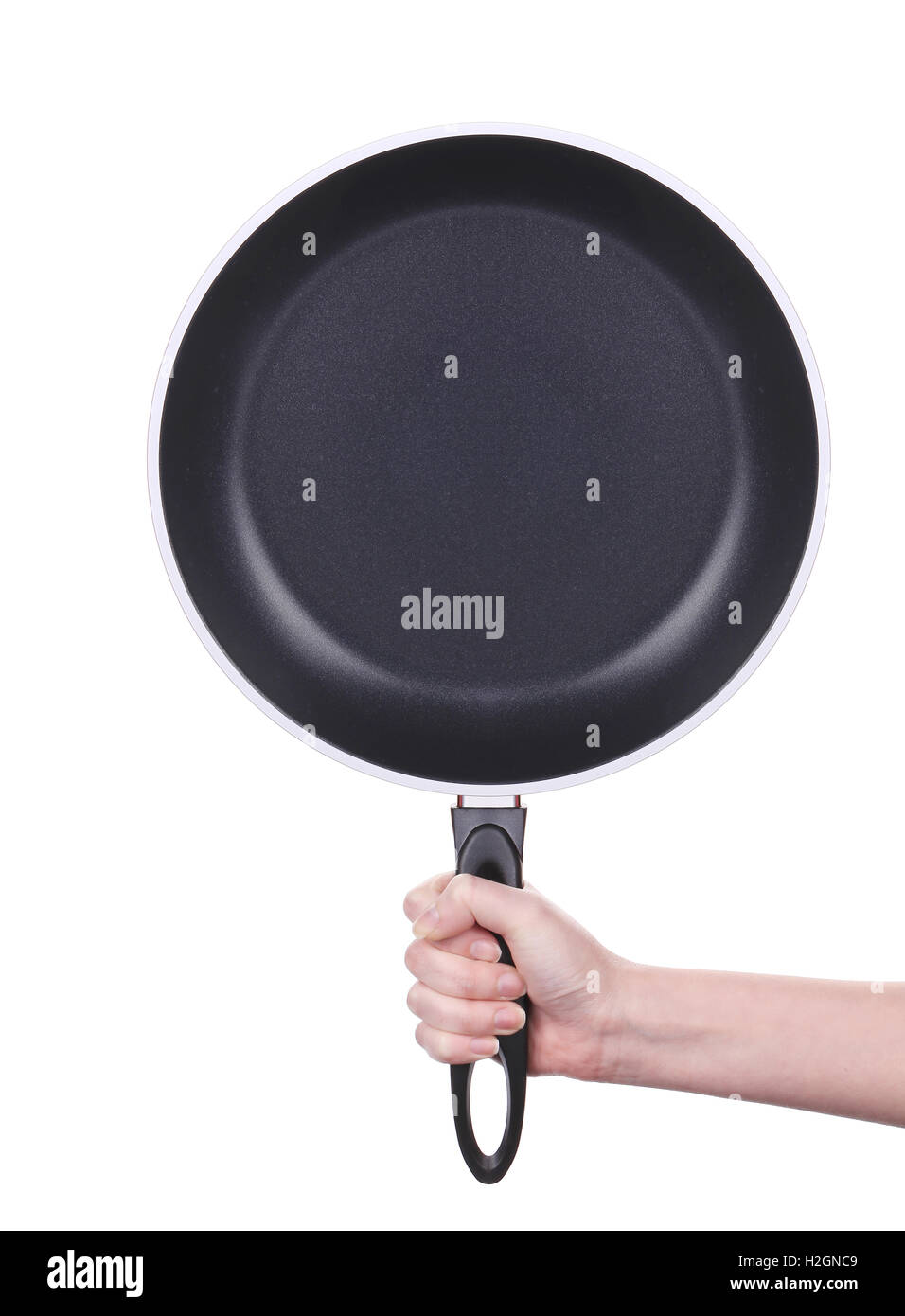 Man holding frying pan Cut Out Stock Images & Pictures - Alamy