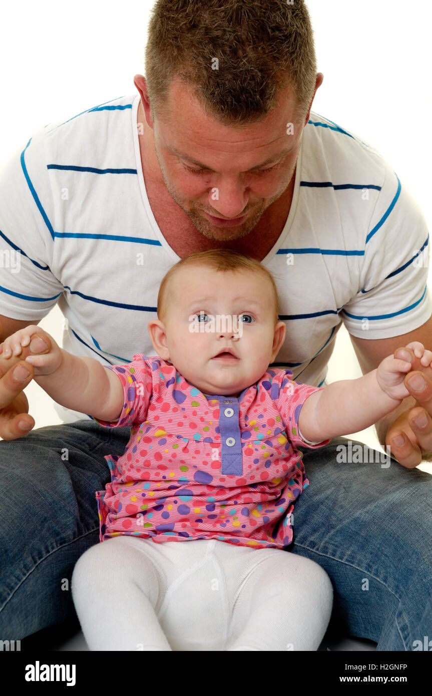 Father and baby are playing Stock Photo - Alamy