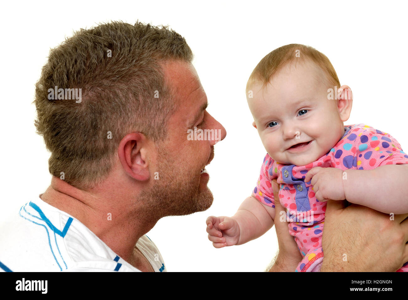 Smiling father and baby Stock Photo - Alamy