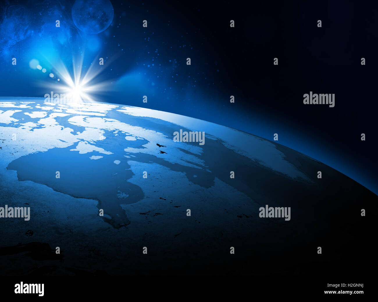 Earth planet in sun rays Stock Photo - Alamy