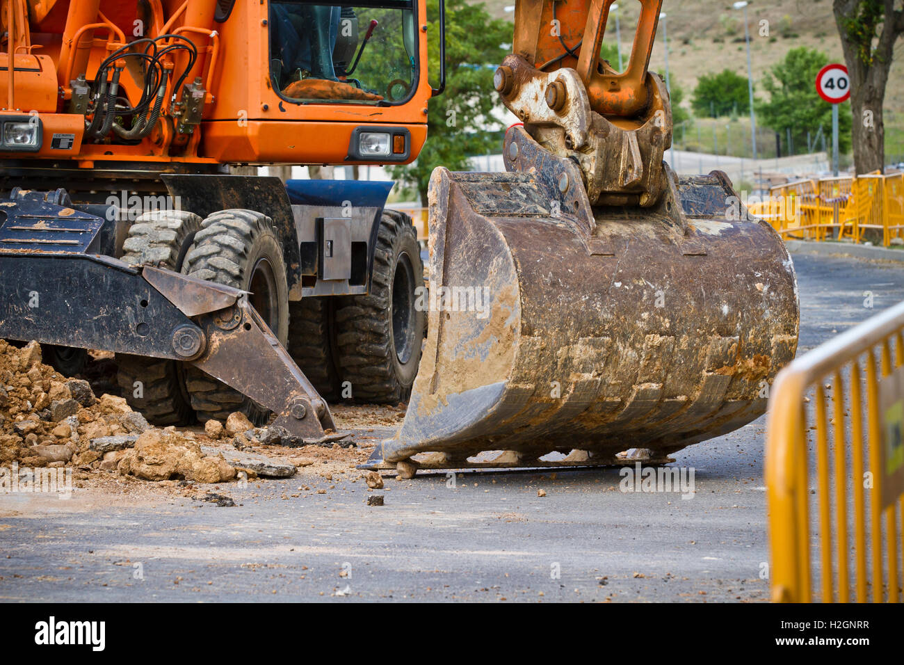 Closeup skid steer loader excavator at road construction work Stock ...