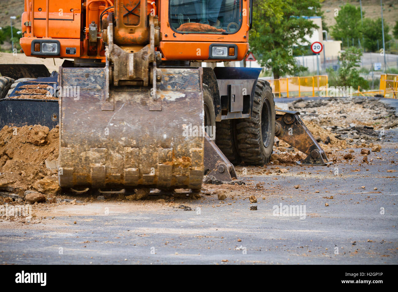 Closeup skid steer loader excavator at road construction work Stock ...