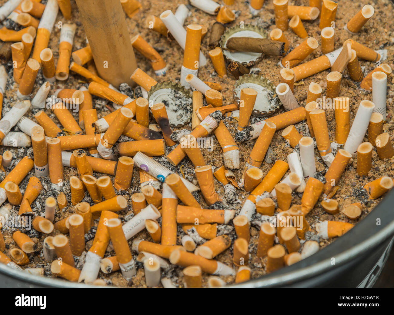 Extinguished cigarettes, cigarette butts in an ashtray Stock Photo - Alamy
