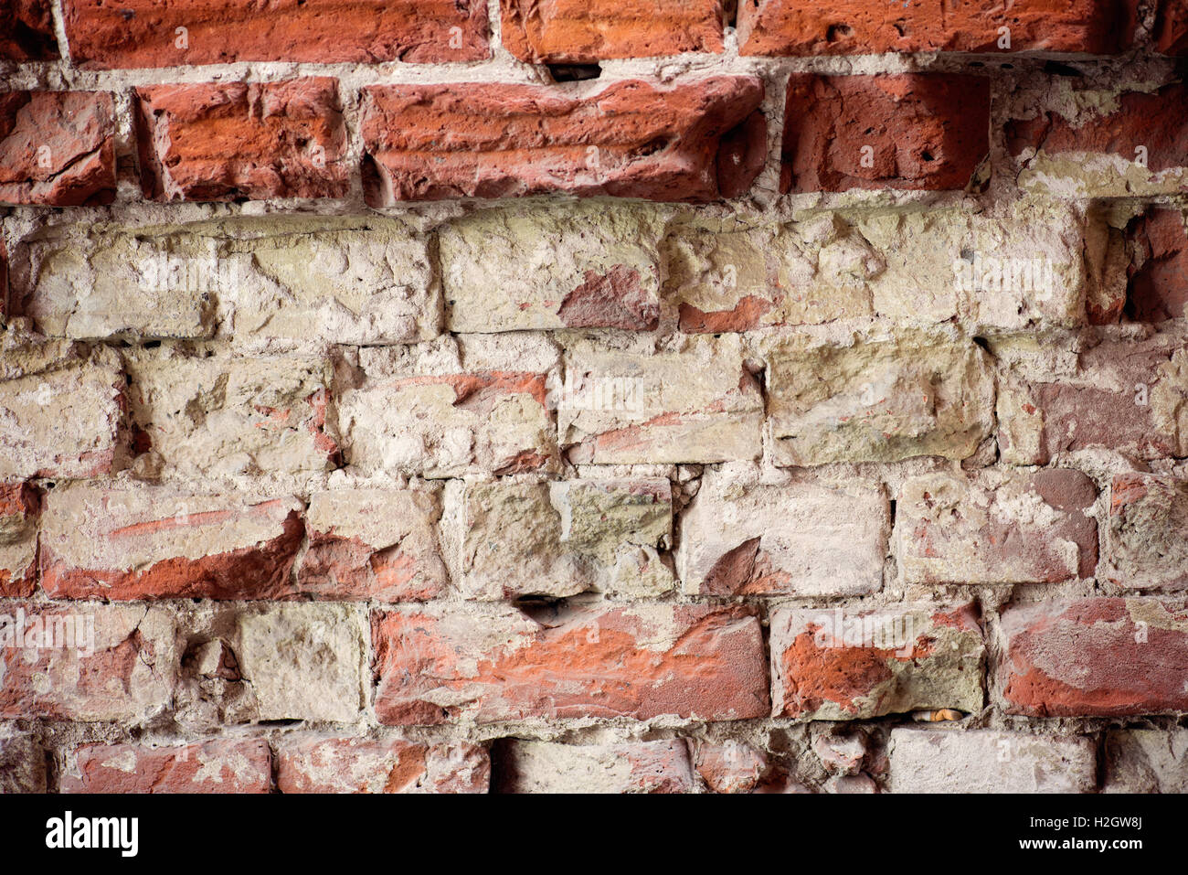 Background of cracked brick wall texture Stock Photo - Alamy