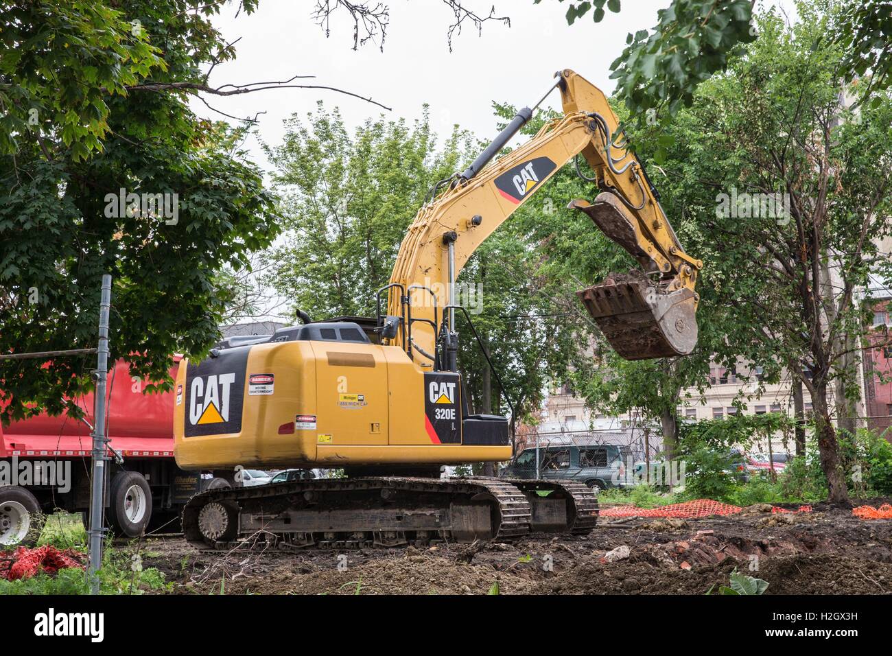 Caterpillar 320E L excavator on a construction site in Detroit, USA ...