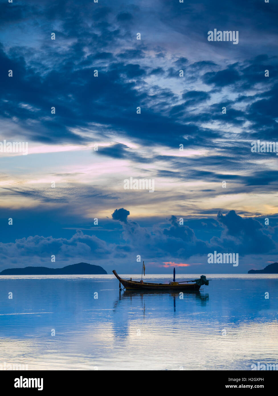 Long tailed boat Ruea Hang Yao at sunrise in Phuket Thailand Stock ...