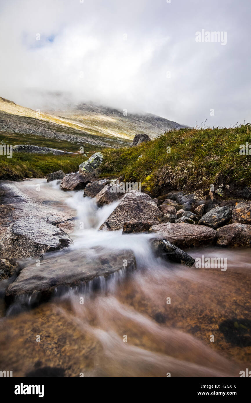 Stream flowing down mountain hi-res stock photography and images - Alamy
