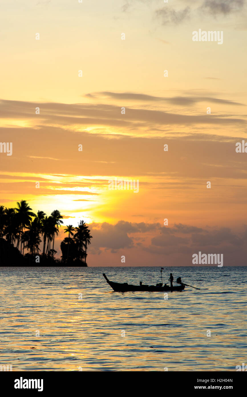 Beautiful sunrise in Rawai Phuket island Thailand with Long tailed boat ...