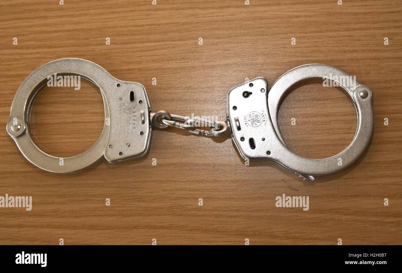 Police handcuffs. 13.08.2016 | usage worldwide Stock Photo - Alamy