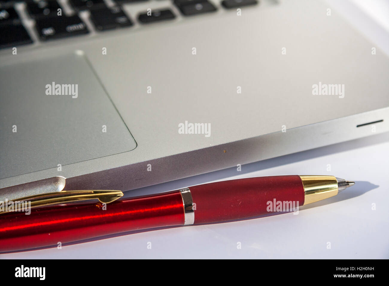 Ballpoint Pen And Laptop Stock Photo - Alamy