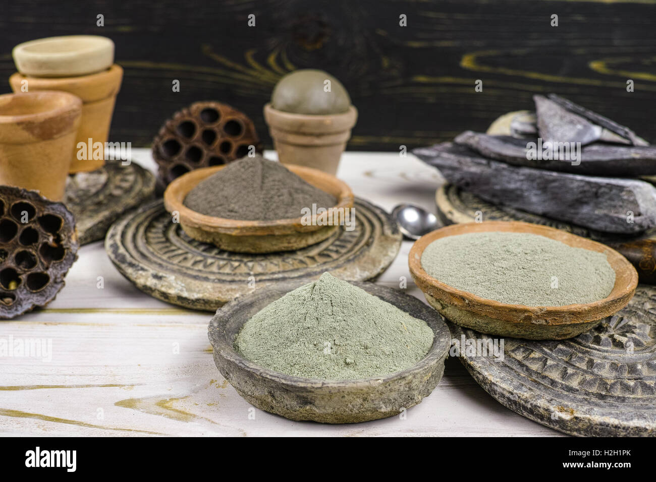 Ancient minerals - black, green, blue clay powder and mud mask for spa ...
