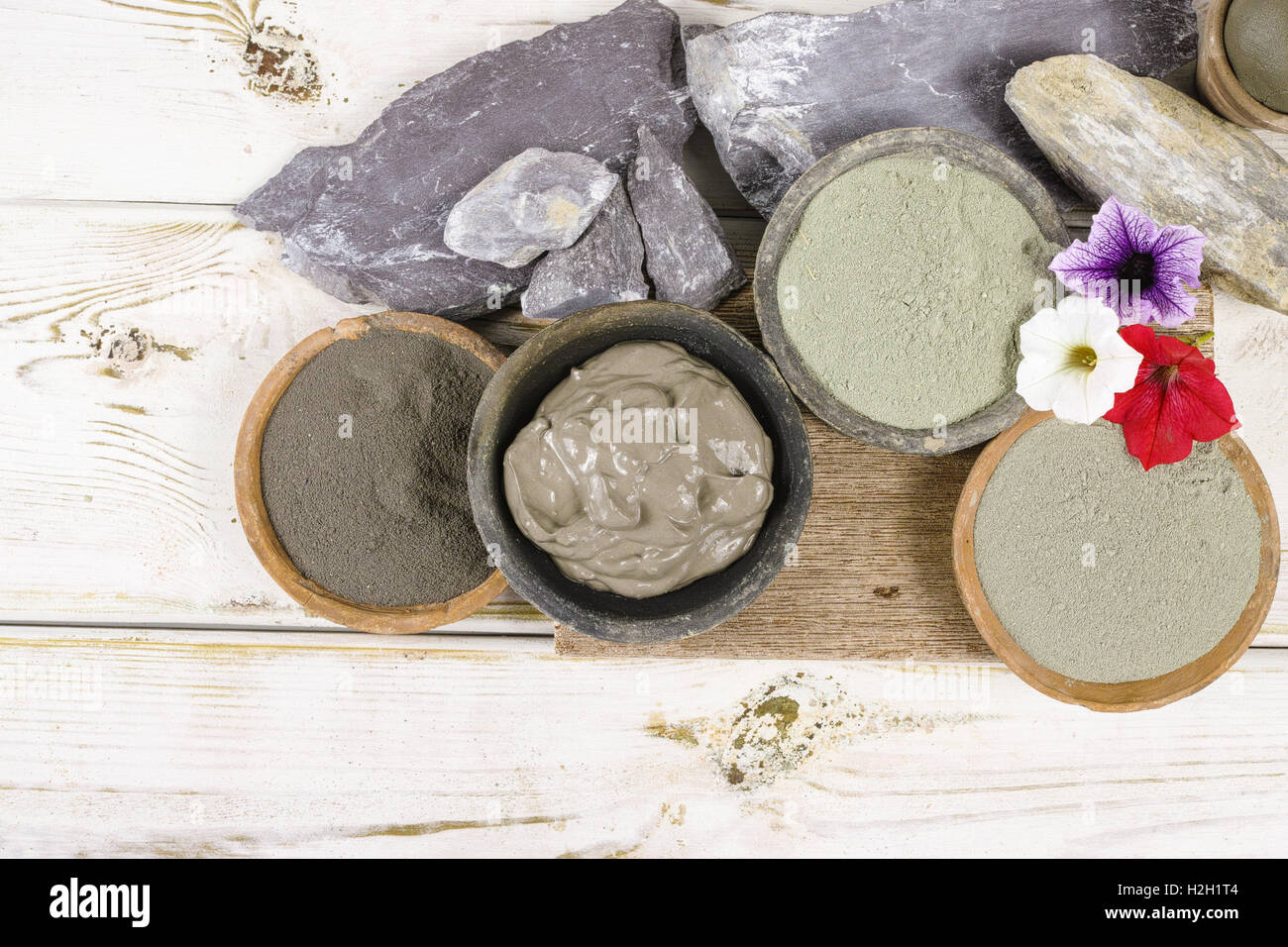 Ancient minerals - green and blue clay powder and mud mask for spa ...