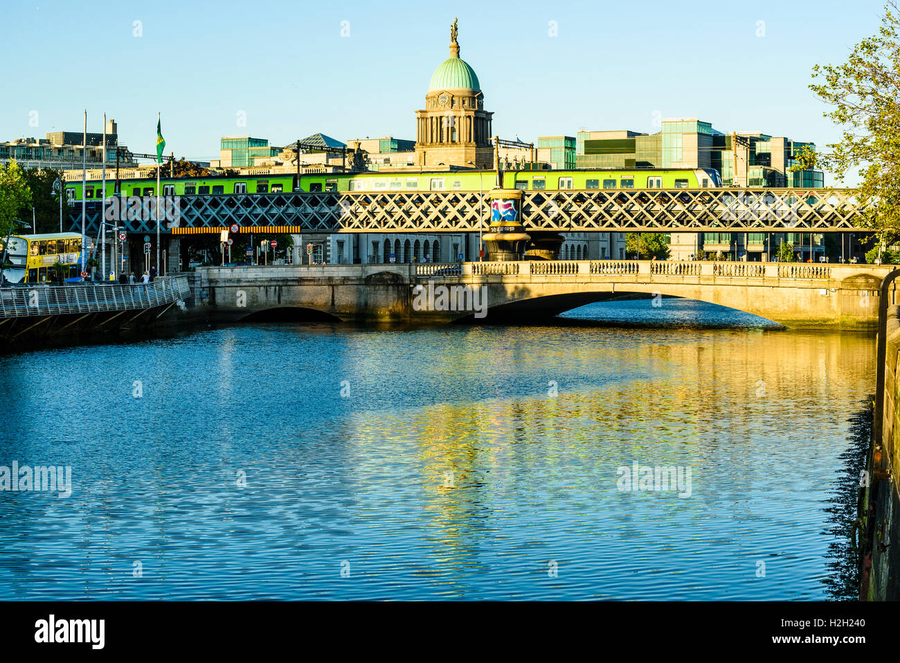 Commuter train crossing Loopline Bridge (Liffey Viaduct) Dublin Ireland ...