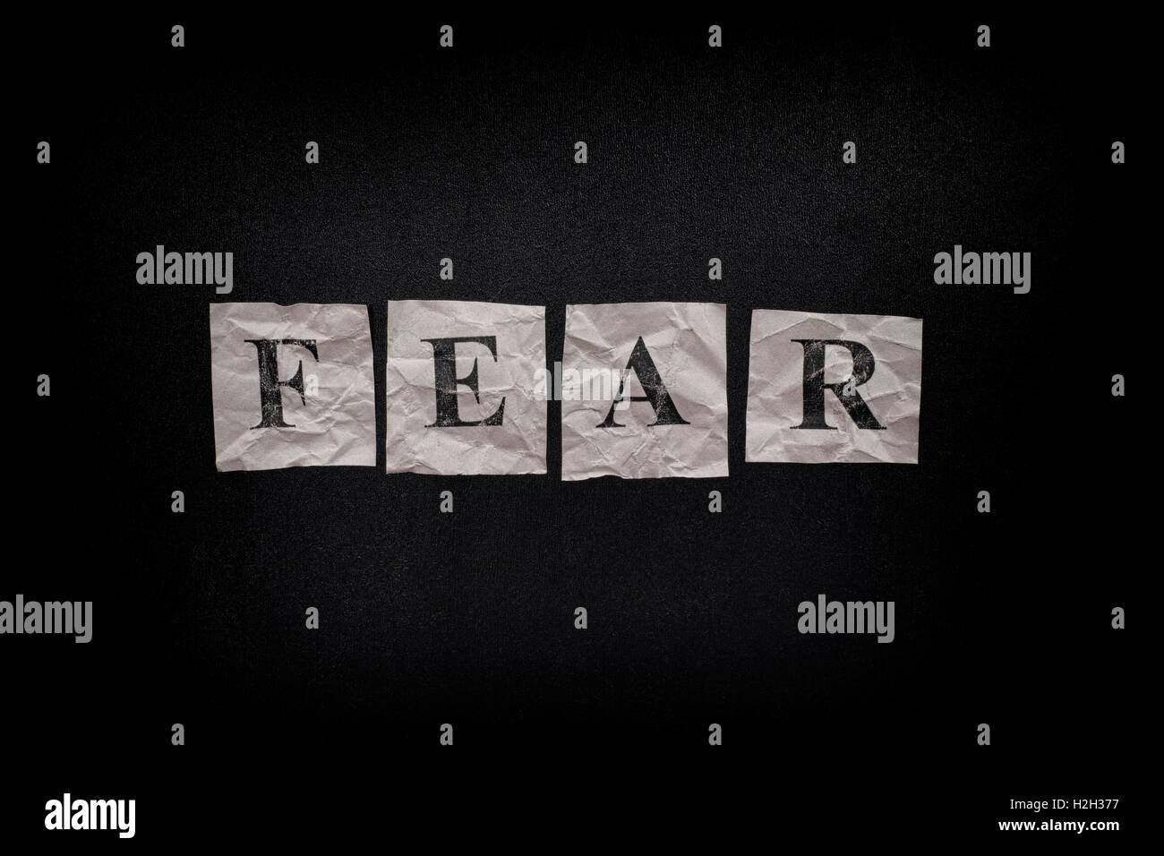 Word Fear on a blackboard. Close up Stock Photo - Alamy