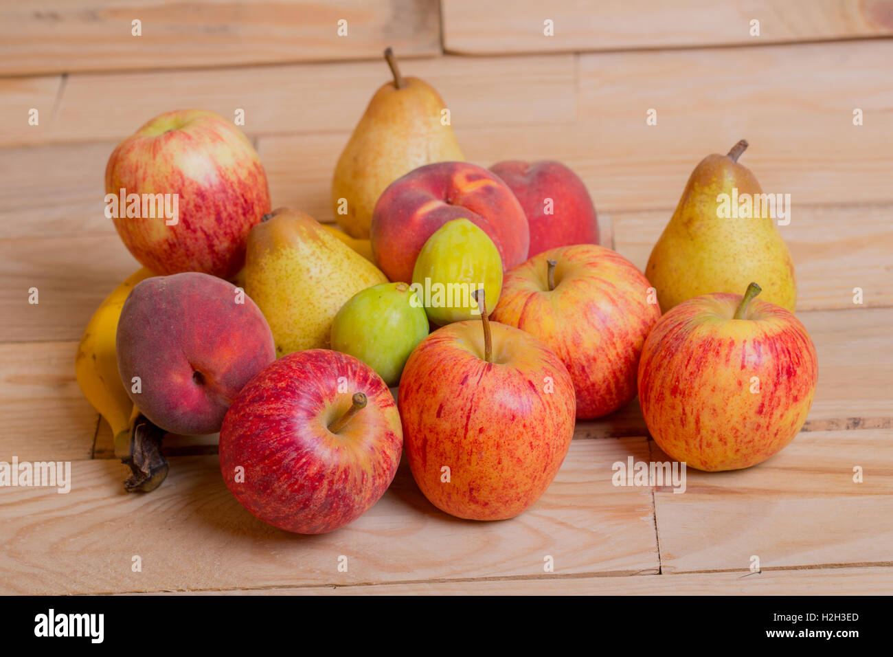 fruits on wooden table, studio picture Stock Photo - Alamy