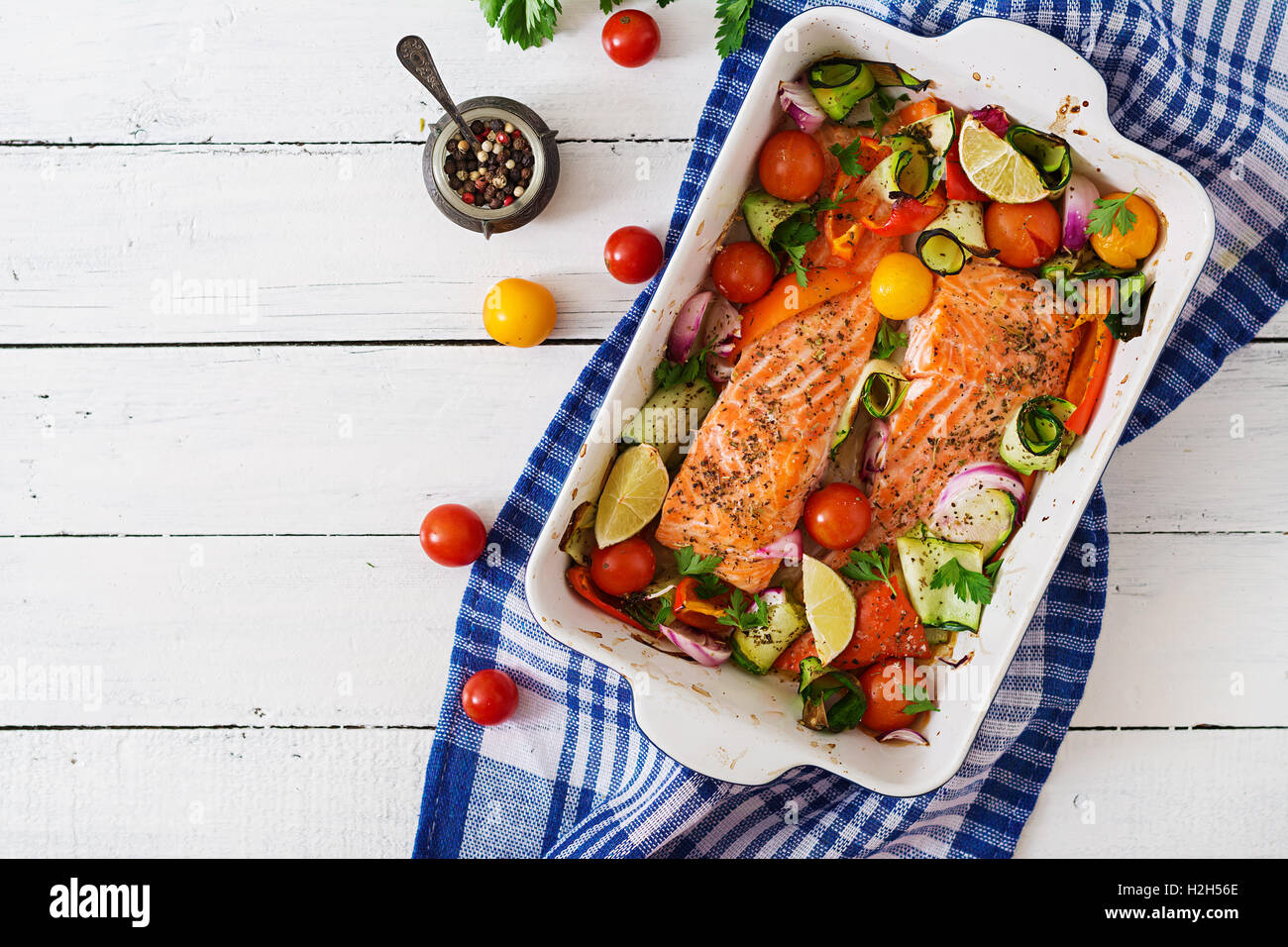Baked salmon fillet with vegetables. Top view Stock Photo - Alamy