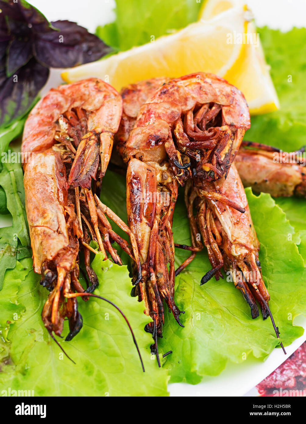 Grilled Tiger shrimps in ginger-garlic marinade Stock Photo - Alamy
