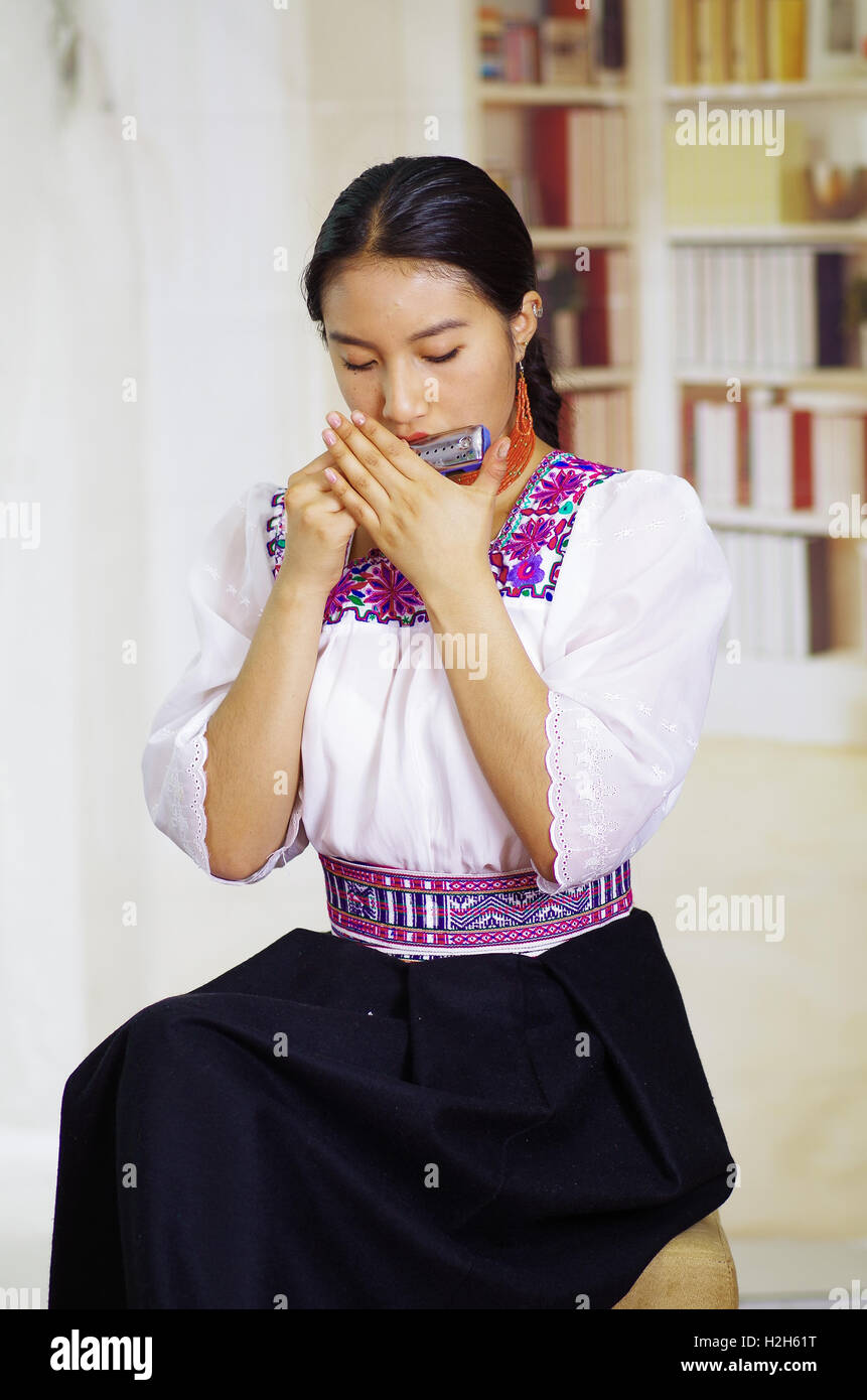 Portrait Of Young Pretty Woman Wearing Beautiful Traditional Andean