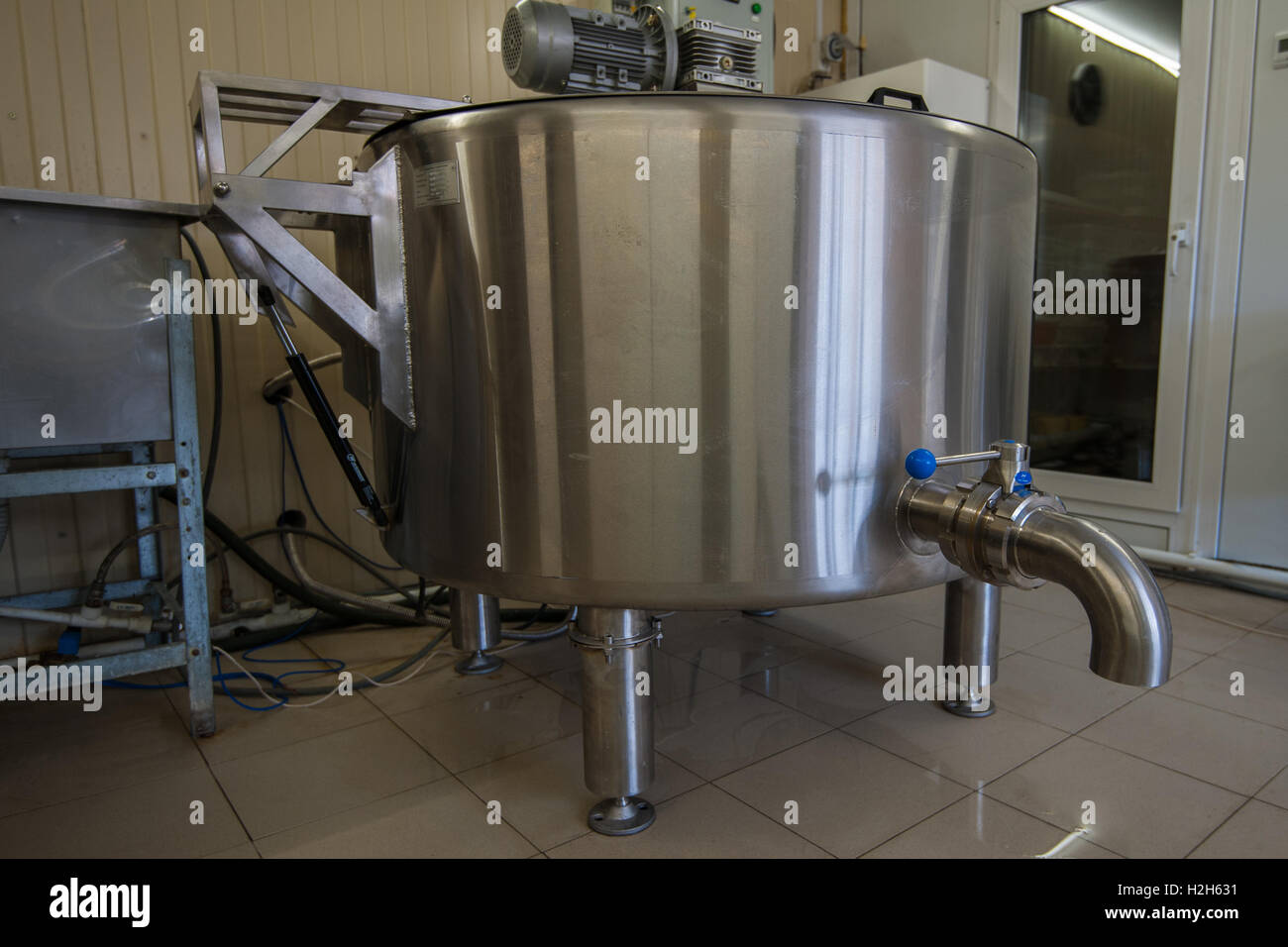 Cheese production at dairy farm Stock Photo - Alamy