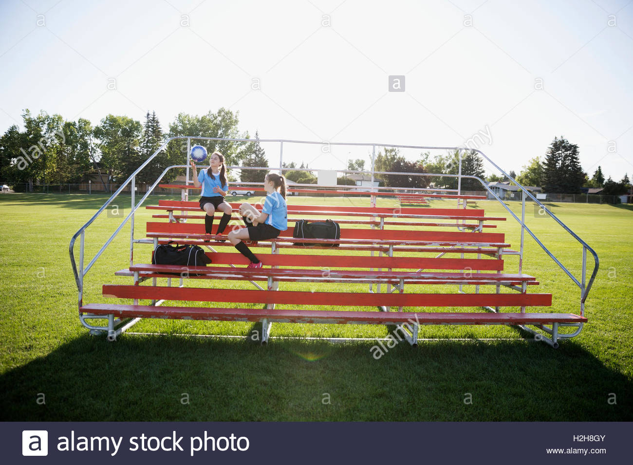 Student sitting on bleachers hi-res stock photography and images - Alamy
