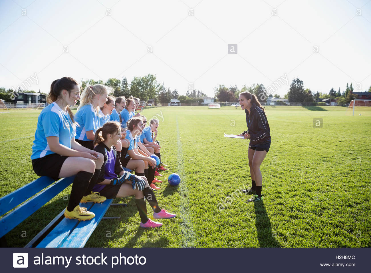 School girl standing on bench hi-res stock photography and images - Alamy